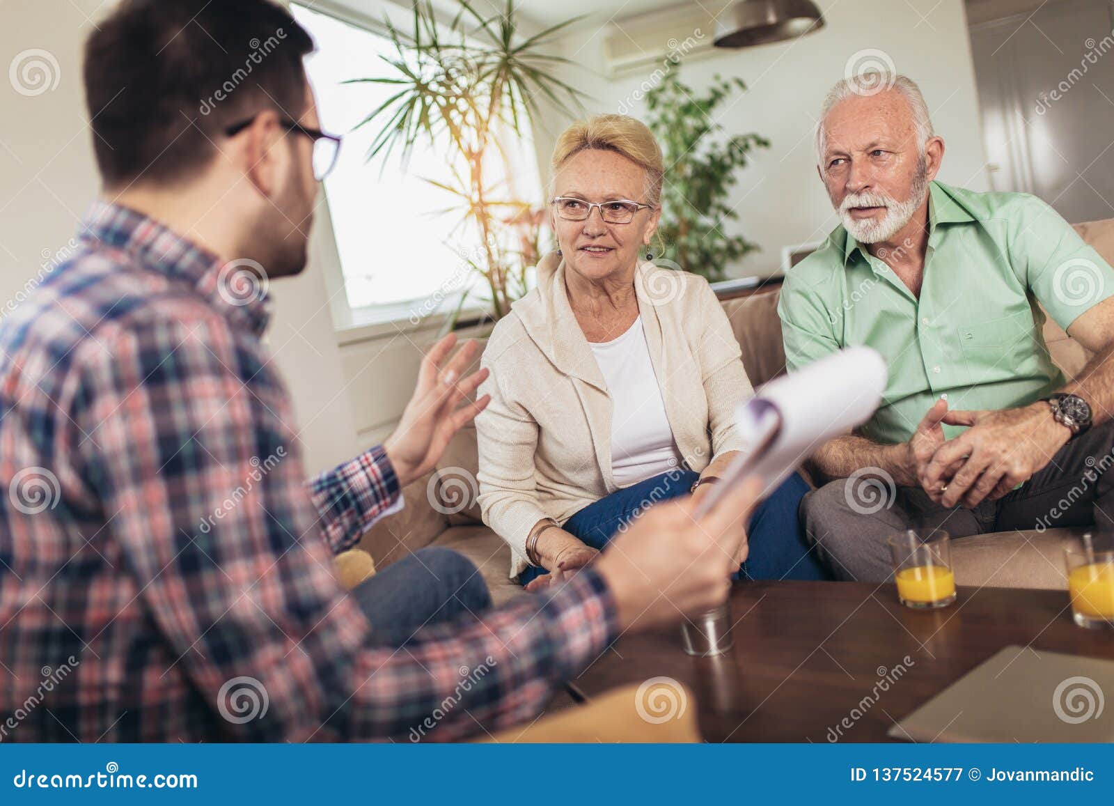 Aged Couple Consulting with Insurance Agent Stock Image - Image of ...