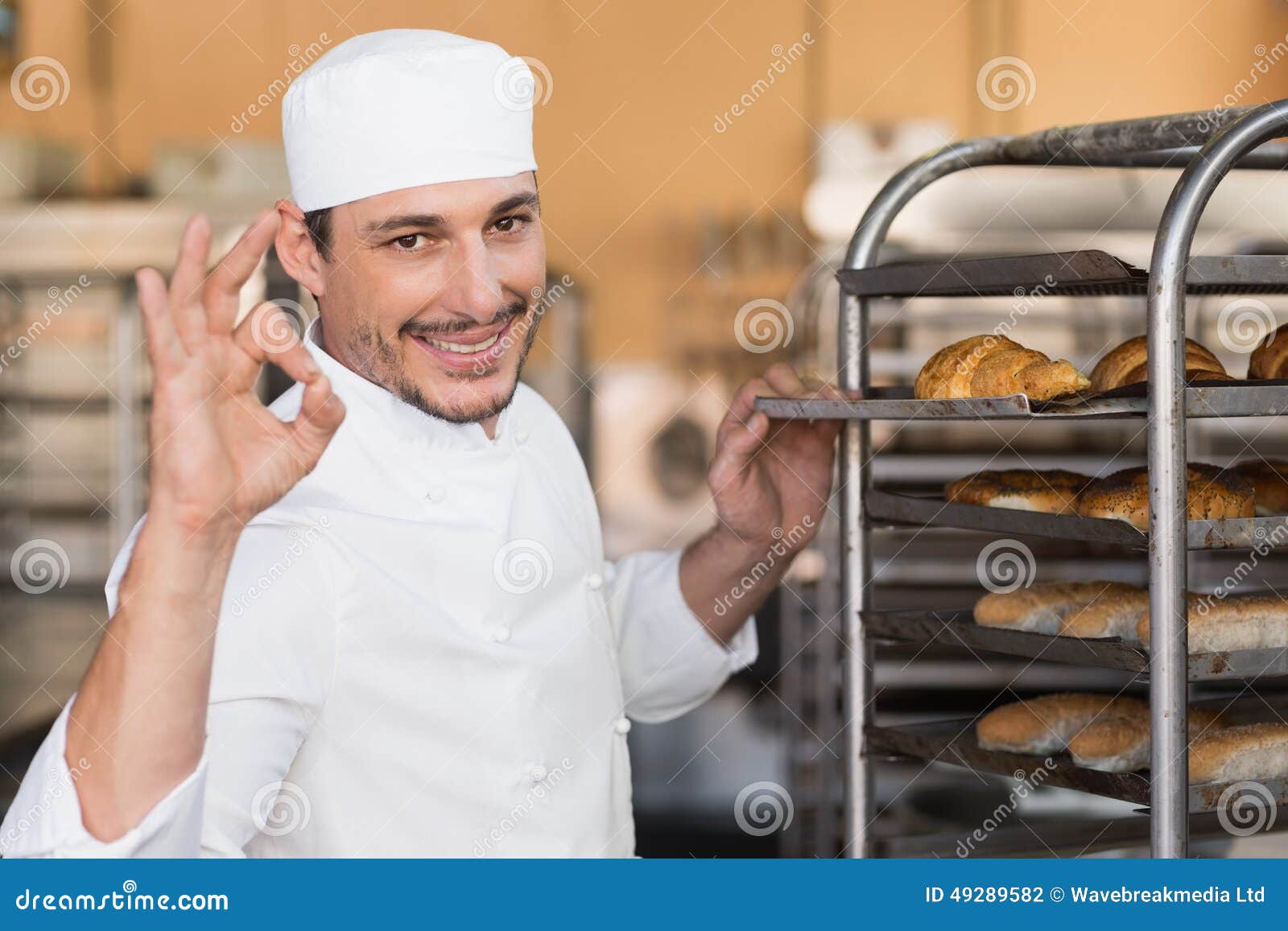 Positive Baker Checking Freshly Baked Bread Stock Photo - Image of ...