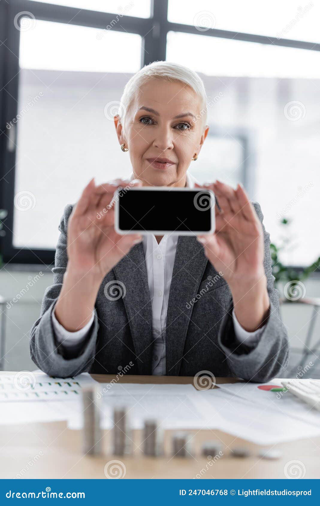Positive Banker Holding Mobile Phone with Stock Photo - Image of ... Positive Banker Holding Mobile Phone with Stock Photo - Image of ...
