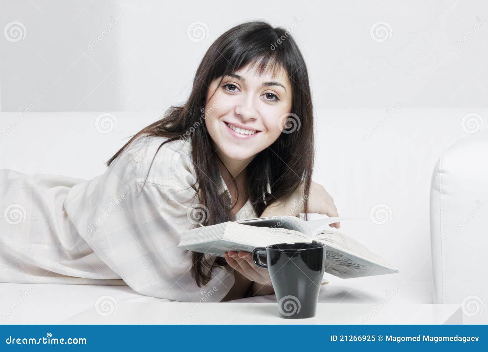 Positive Brunette in Casual Reading Stock Image - Image of sofa ...