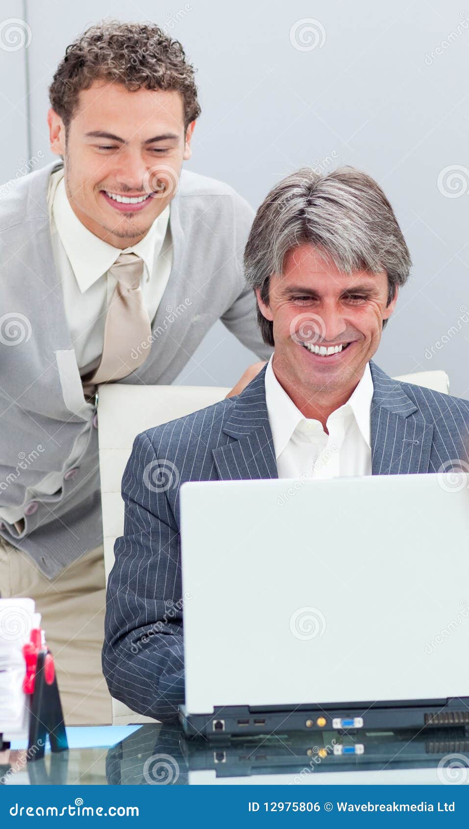 Positive Businessmen Working at a Computer Stock Photo - Image of group ...
