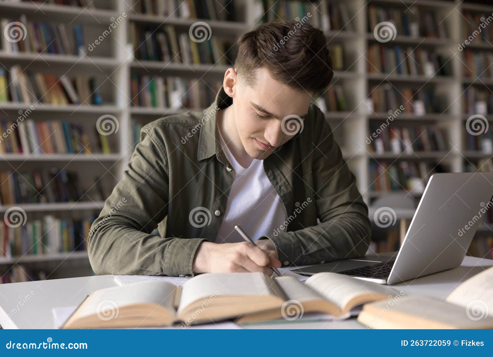 Positive Busy Hardworking Student Guy Writing Draft, Notes Stock Image ...