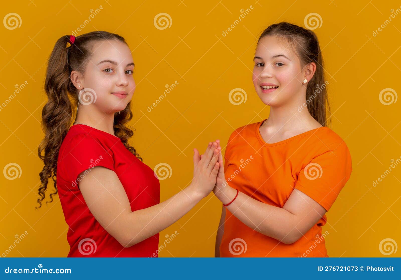 Positive Children on Yellow Background. Hello Gesture Stock Image ...