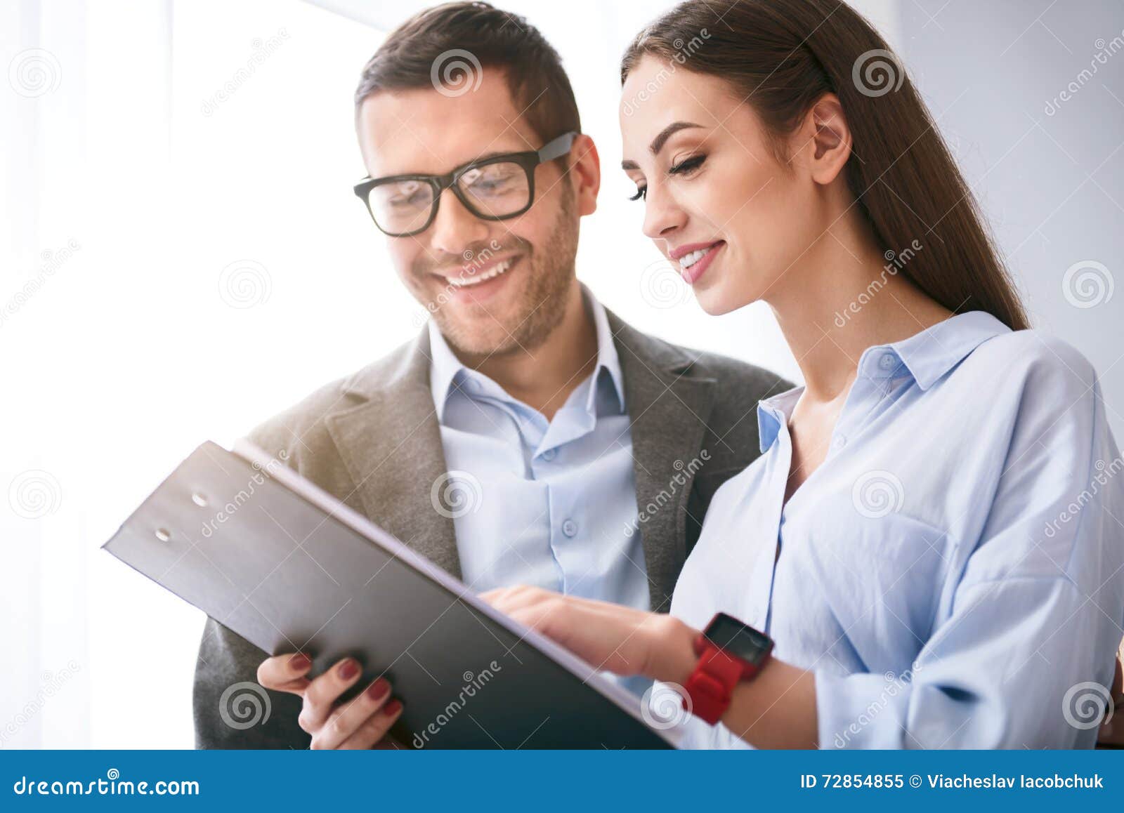 Positive Colleagues Discussing Project Stock Image - Image of modern ...