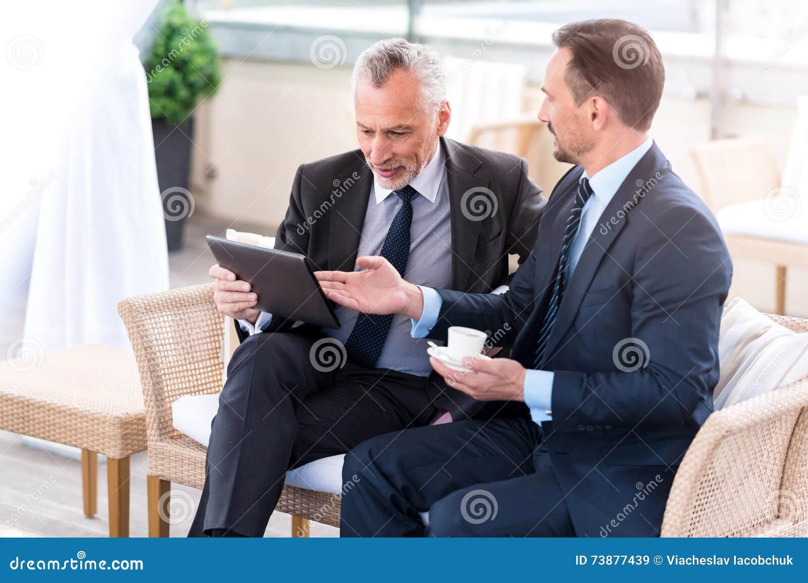 Positive Colleagues Resting on the Couch Stock Image - Image of concept ...