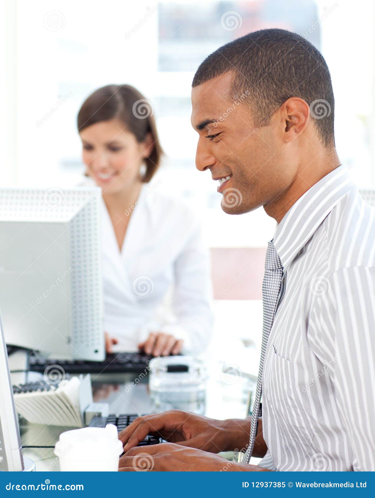 Positive Colleagues Working at a Their Computer Stock Image - Image of ...
