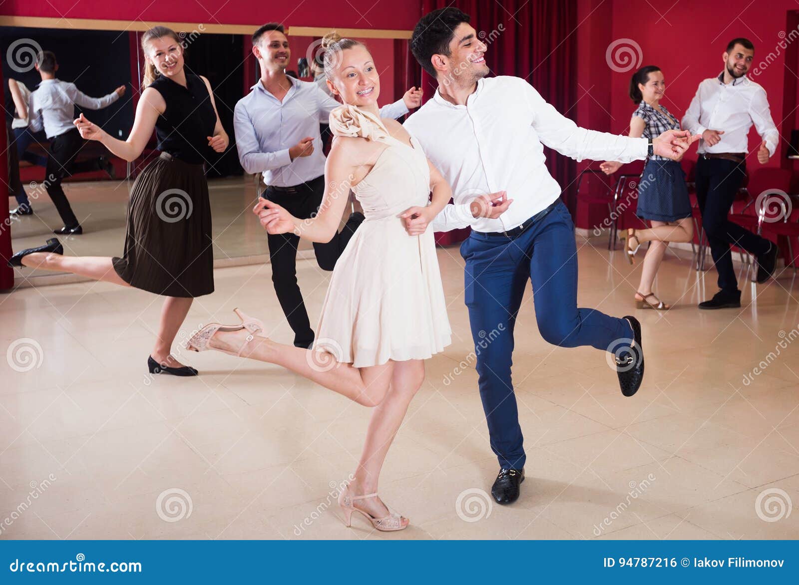 Positive Couple Practicing Vigorous Twist Movements Stock Photo - Image ...