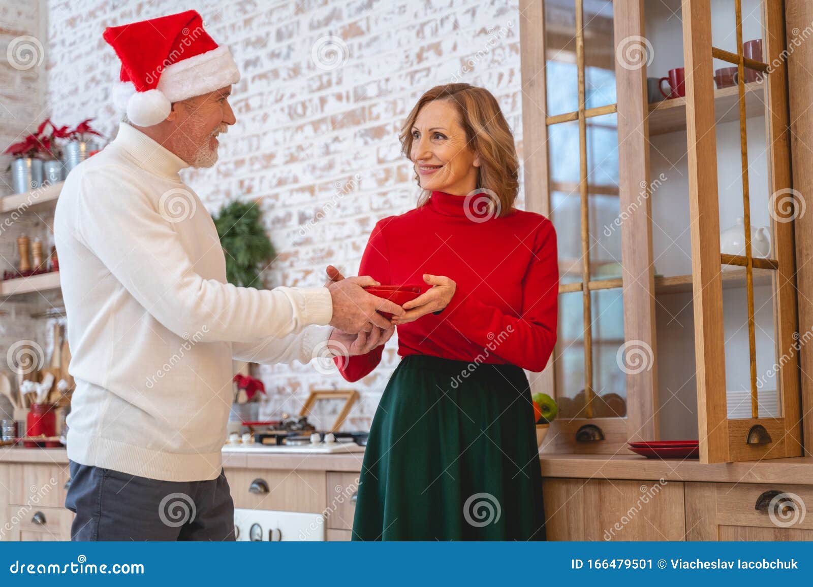 Positive Delighted Mature Man Helping His Wife Stock Image Image Of