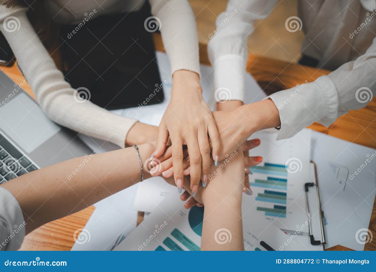 Positive Diverse Business Team Putting Their Hands on Top of Each Other ... Positive Diverse Business Team Putting Their Hands on Top of Each Other ...