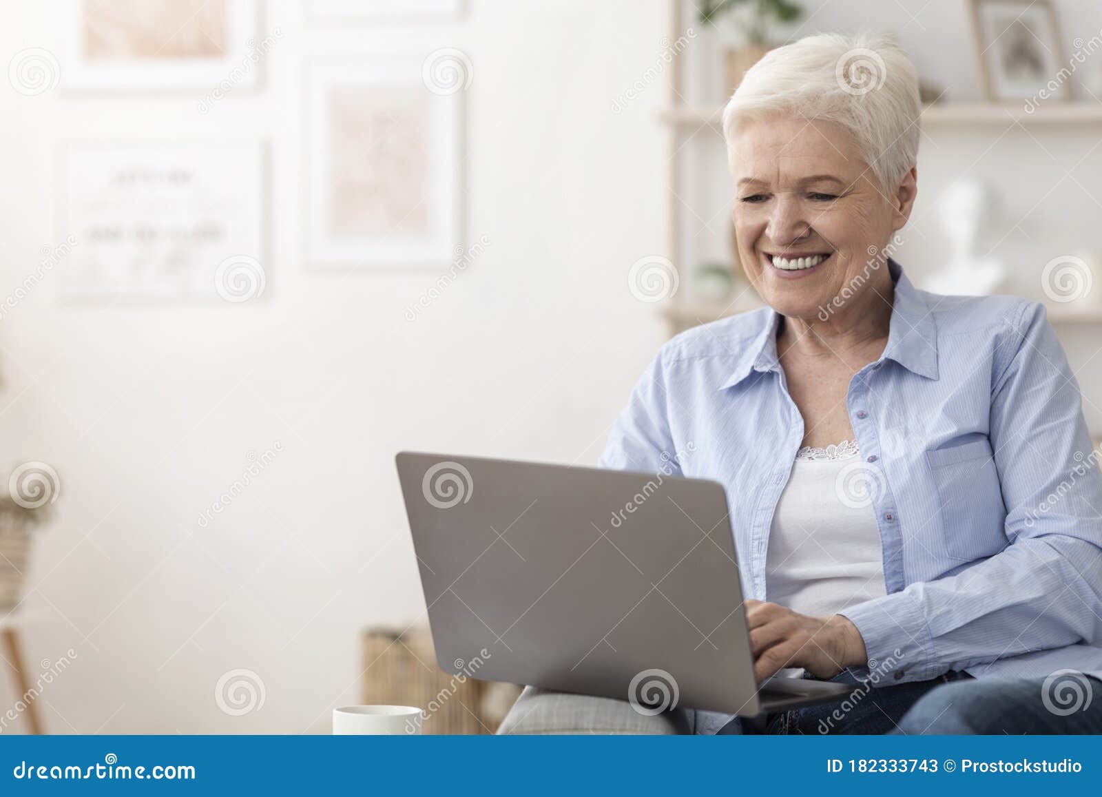 Positive Elderly Lady Using Laptop Computer at Home Stock Image - Image ...