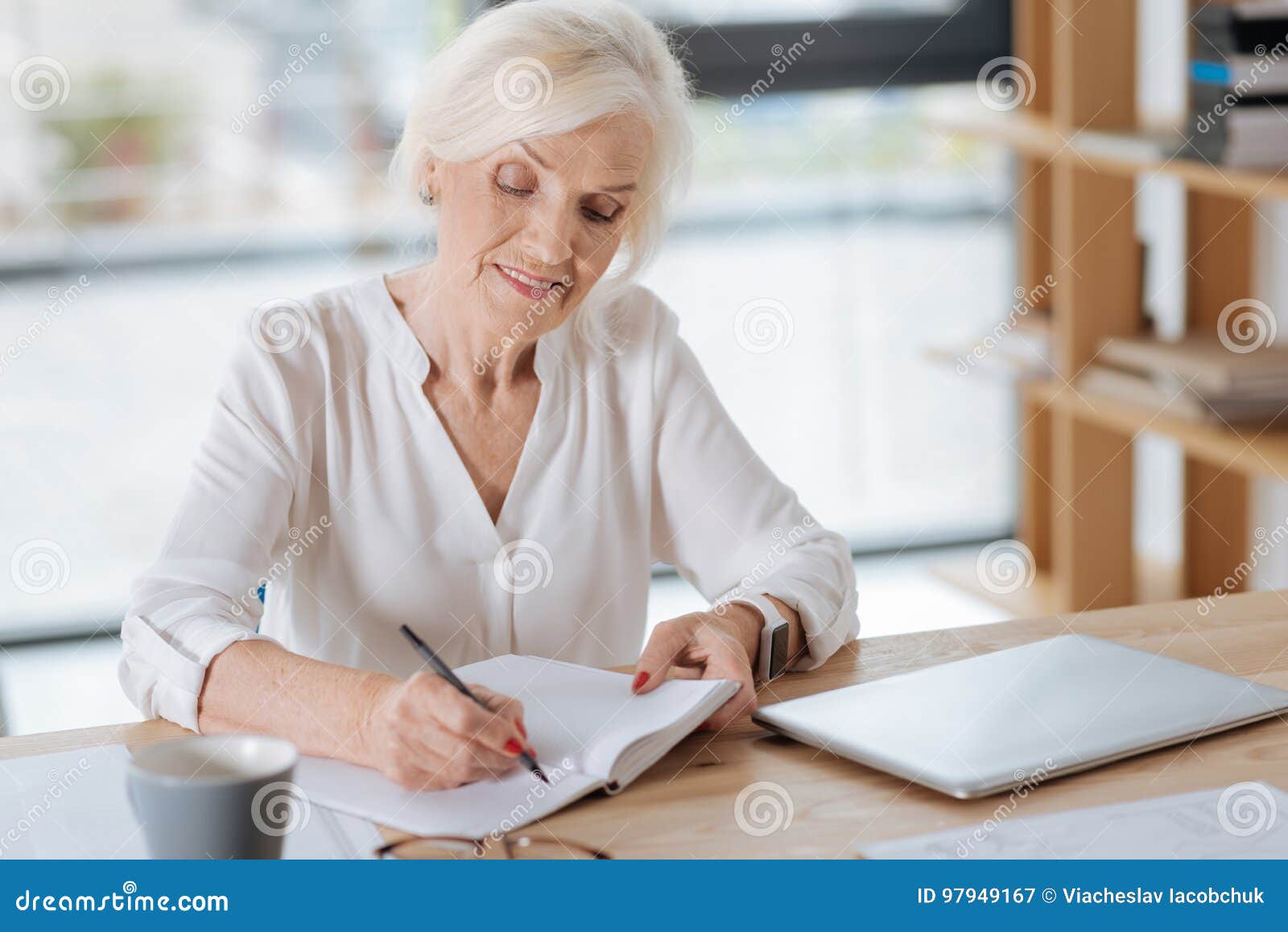 Positive Elderly Woman Taking Notes Stock Image - Image of manager ...