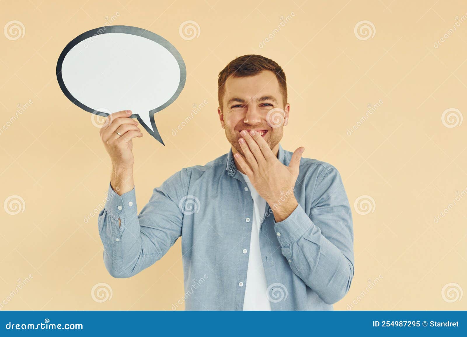 Positive Emotions. Man Standing in the Studio with Empty Signs for the ...