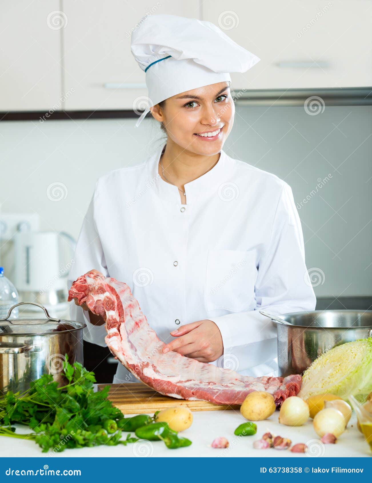Positive Female Chef Working with Pork Ribs Stock Photo - Image of ...