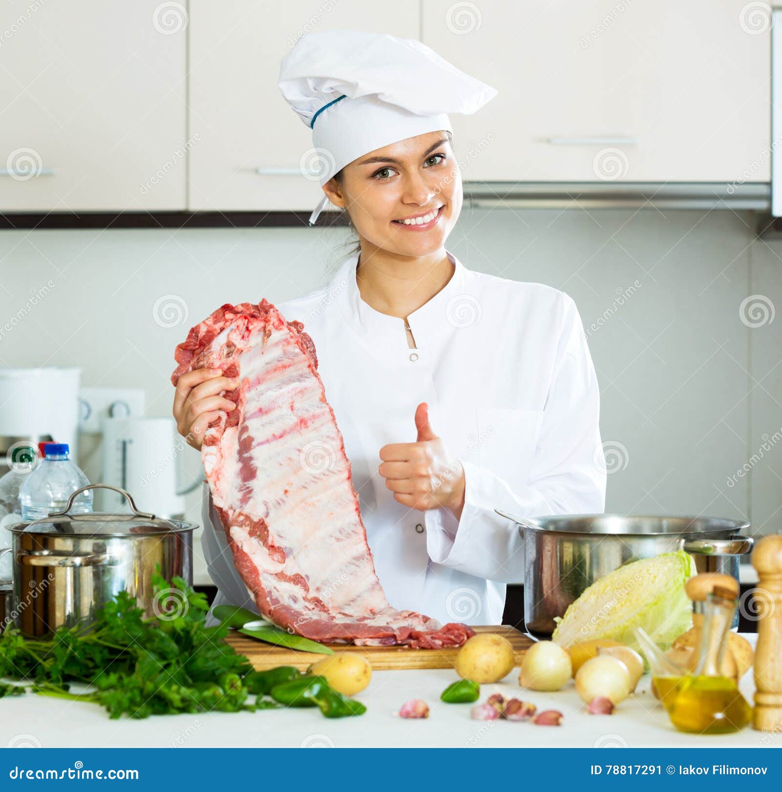 Positive Female Chef Working with Pork Ribs Stock Image - Image of ...