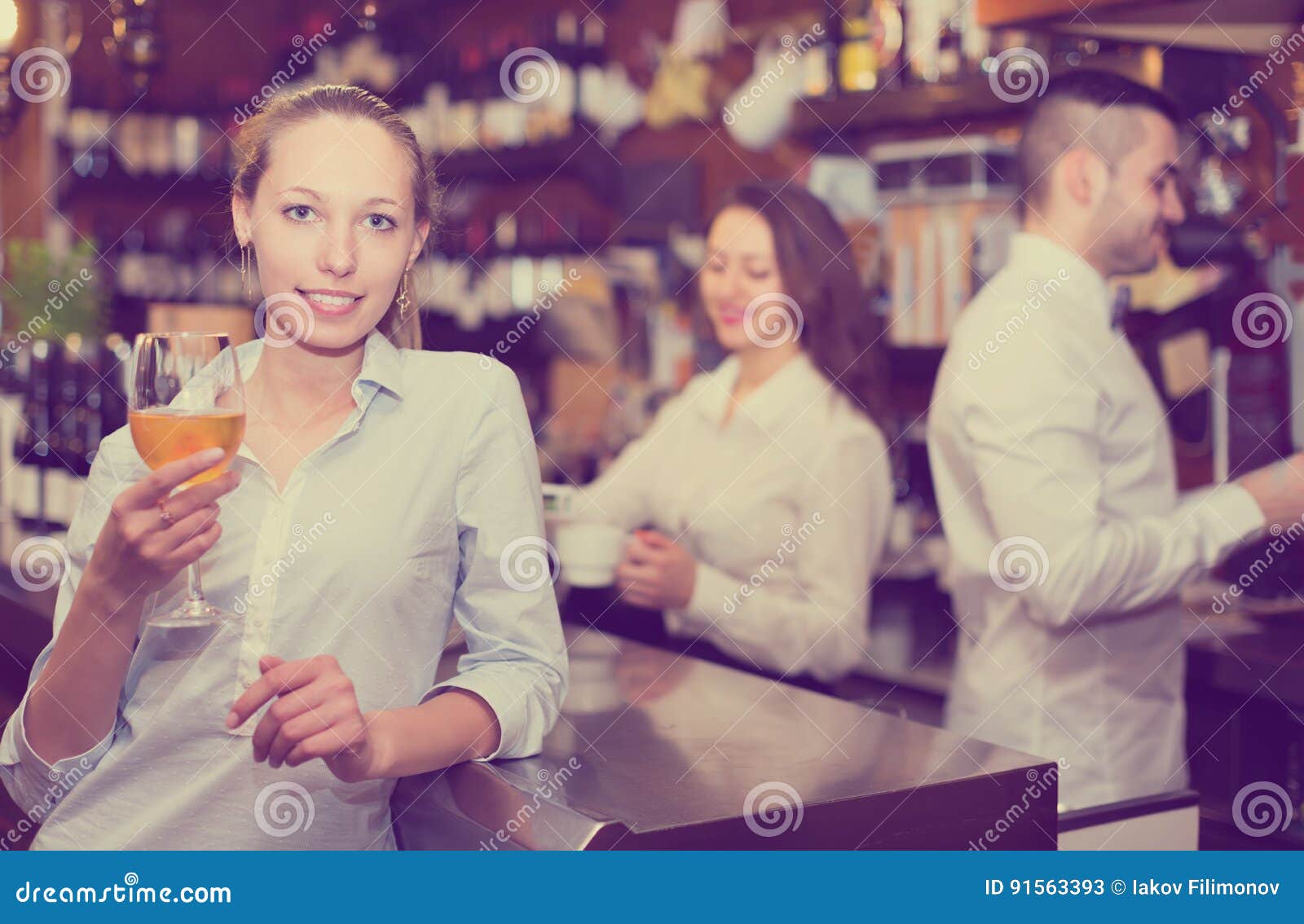 Positive Female Drinking Wine at Counter Stock Image - Image of ...