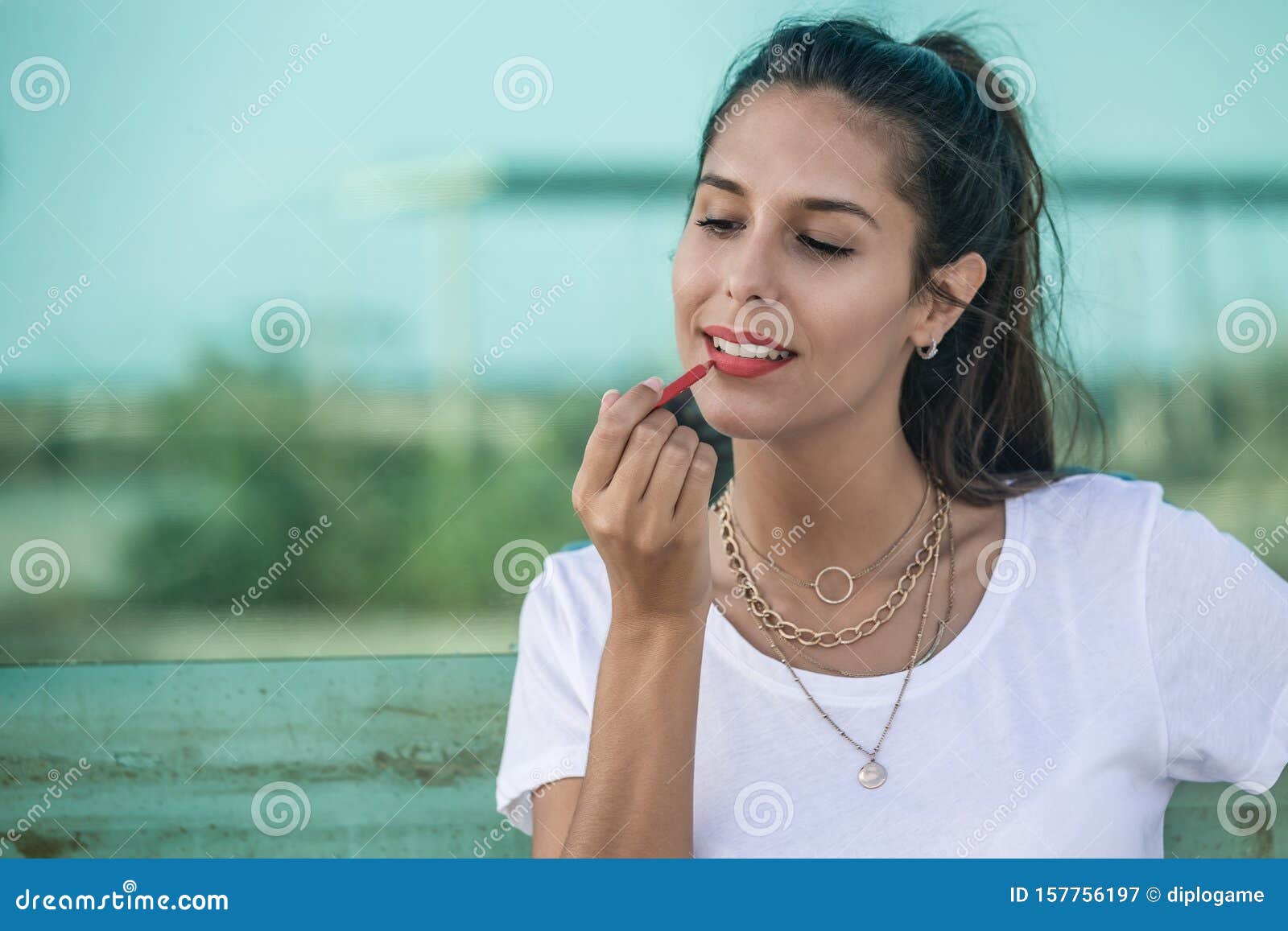 Positive Female Rouging Lips On Street Stock Image Image Of Glamour