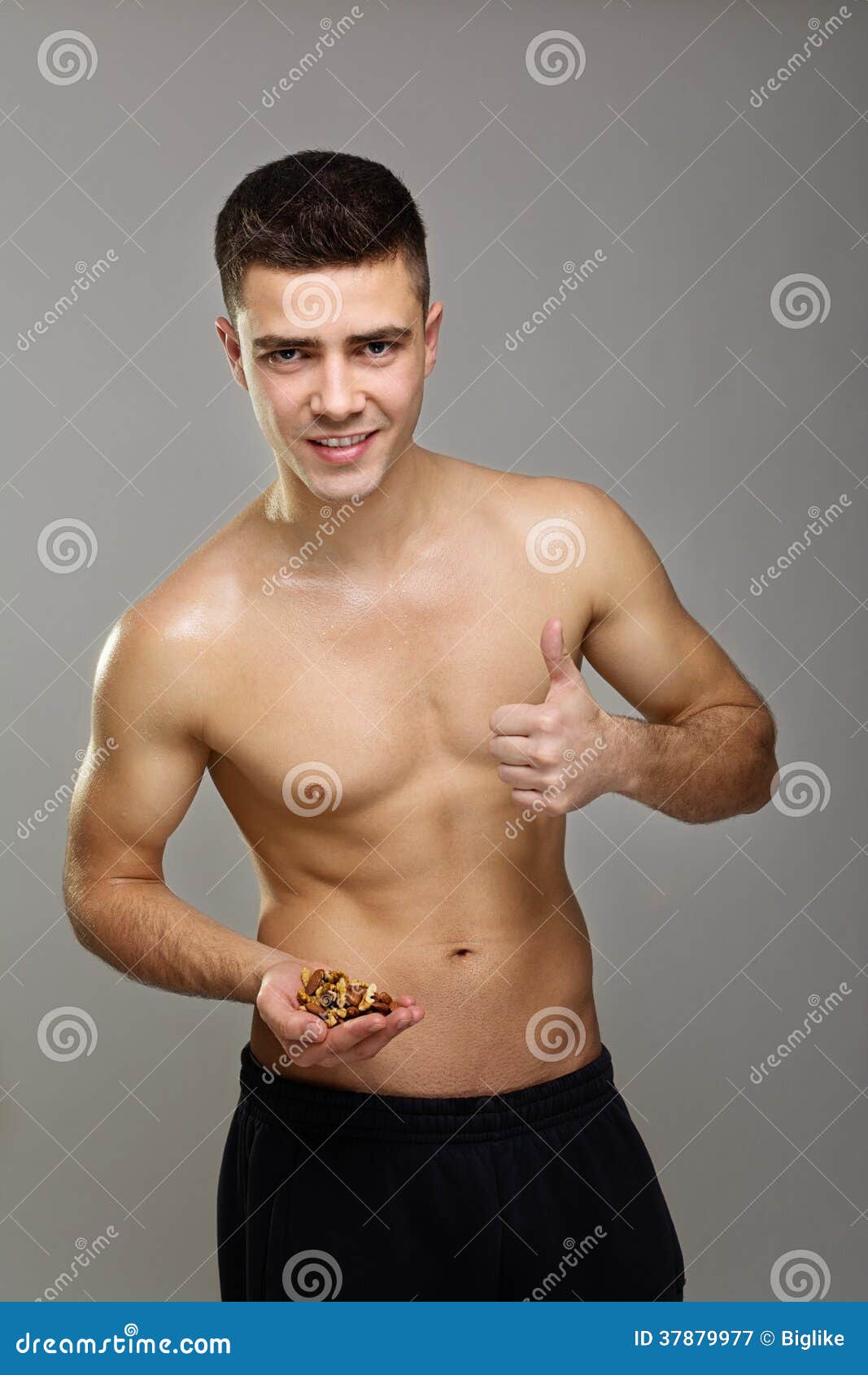 Positive Fit Man Holding Various Healthy Nuts Stock Image - Image of ...