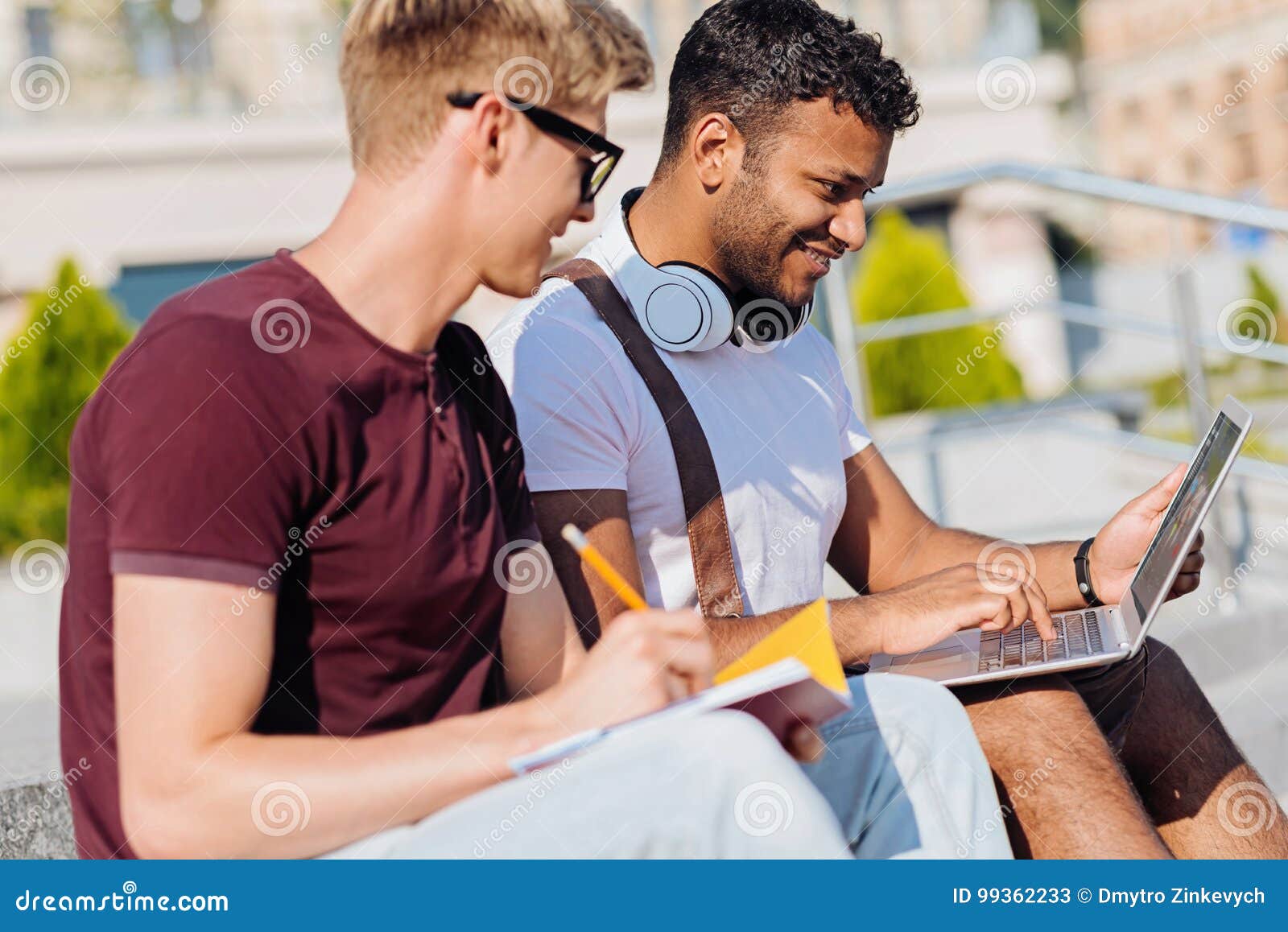 Positive Foreign Student Working with His Partner Stock Image - Image ...