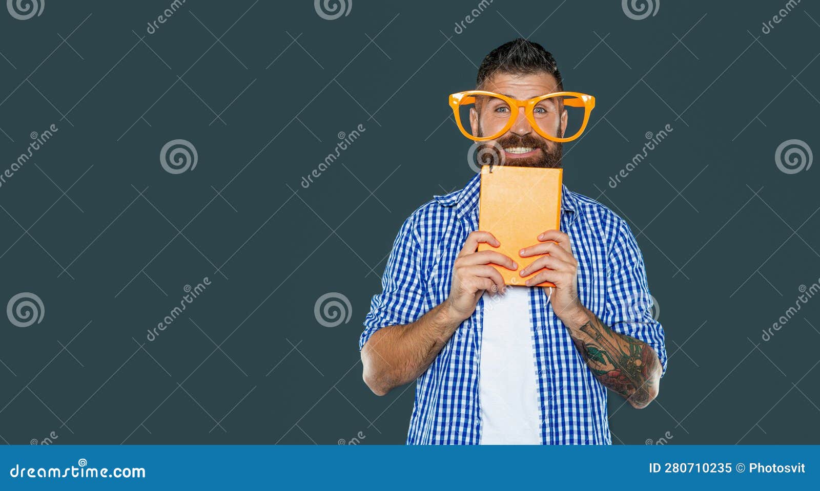 Positive Funny Bearded Man In Party Glasses Hold Book Stock Image