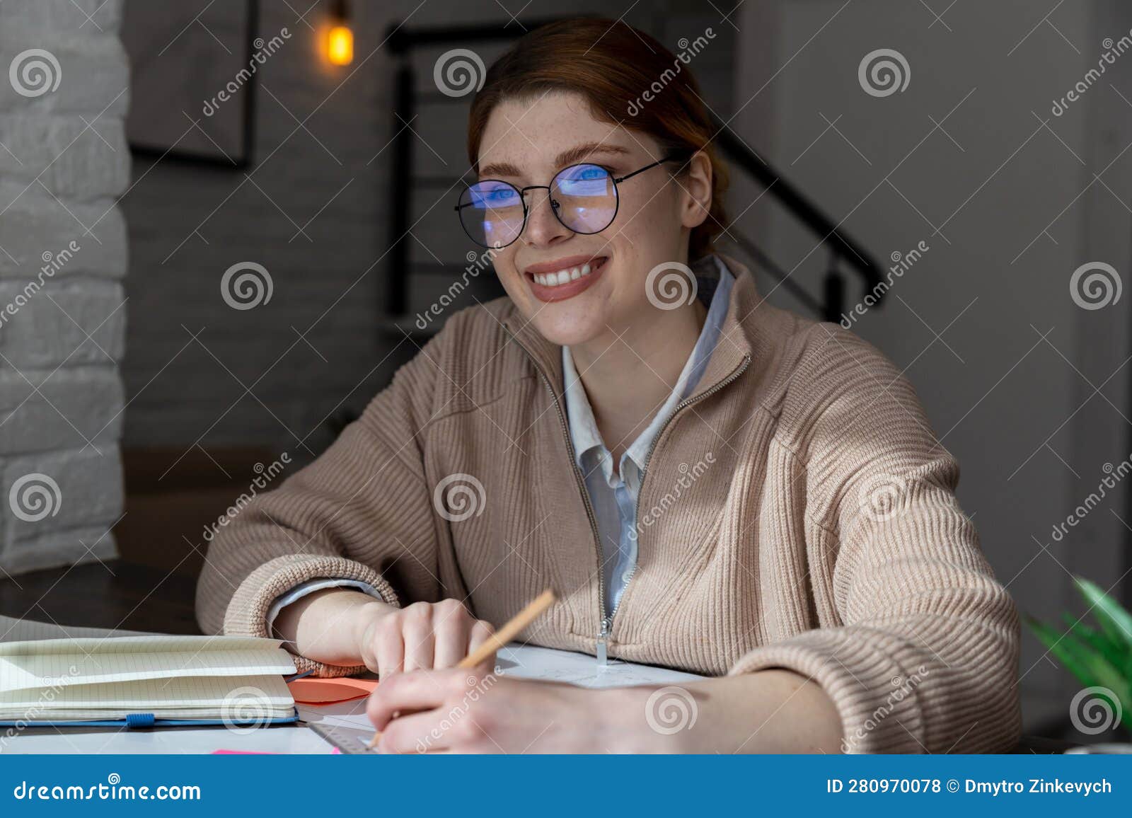 Positive Good-looking Young Woman Working on the Project Stock Photo ...