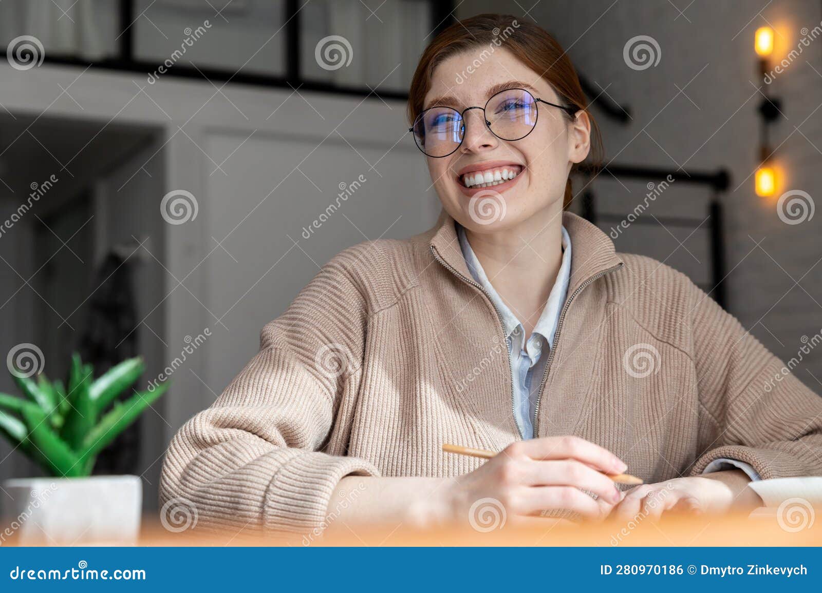 Positive Good-looking Young Woman Working on the Project Stock Photo ...