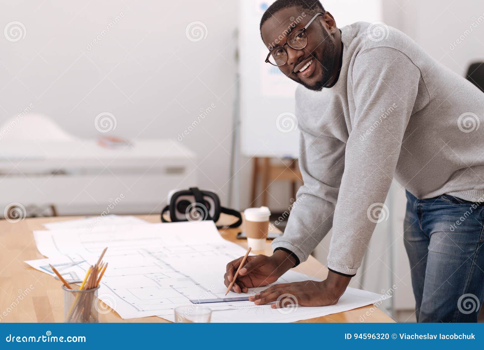 Positive Handsome Man Leaning Over the Table Stock Photo - Image of ...