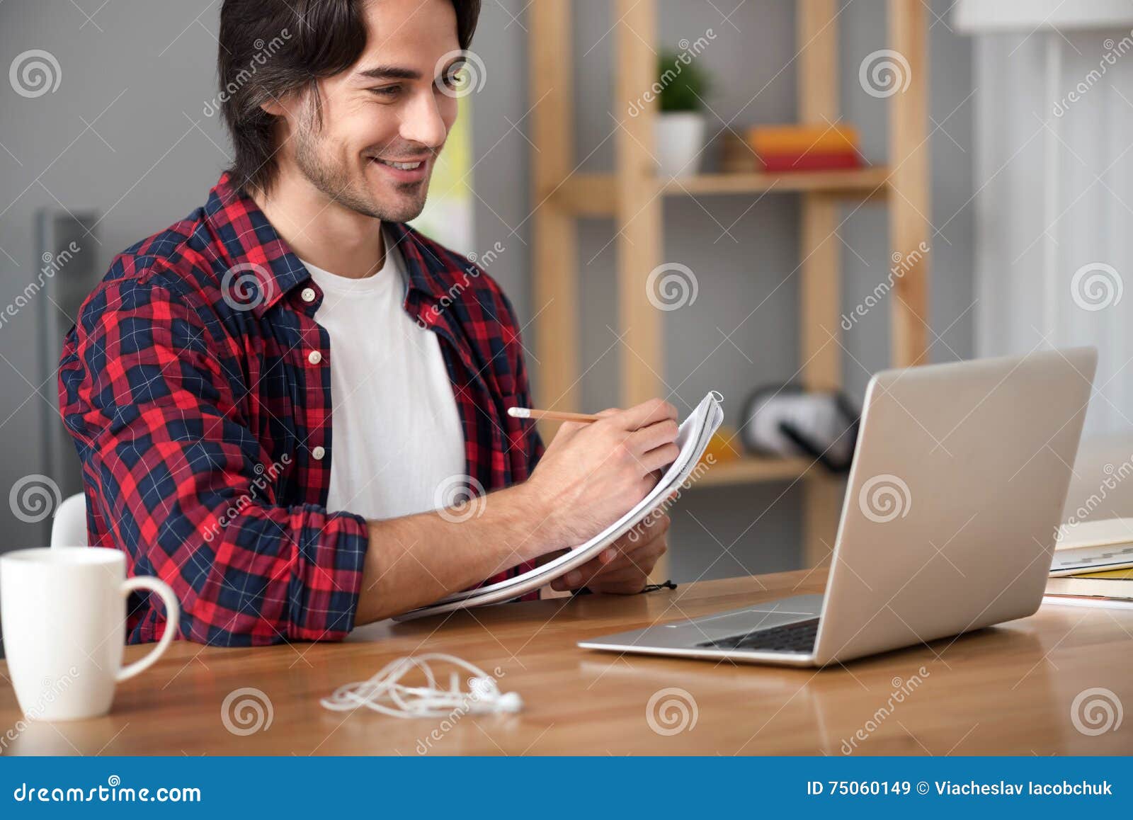 Positive Handsome Man Making Notes Stock Image - Image of cheerful ...