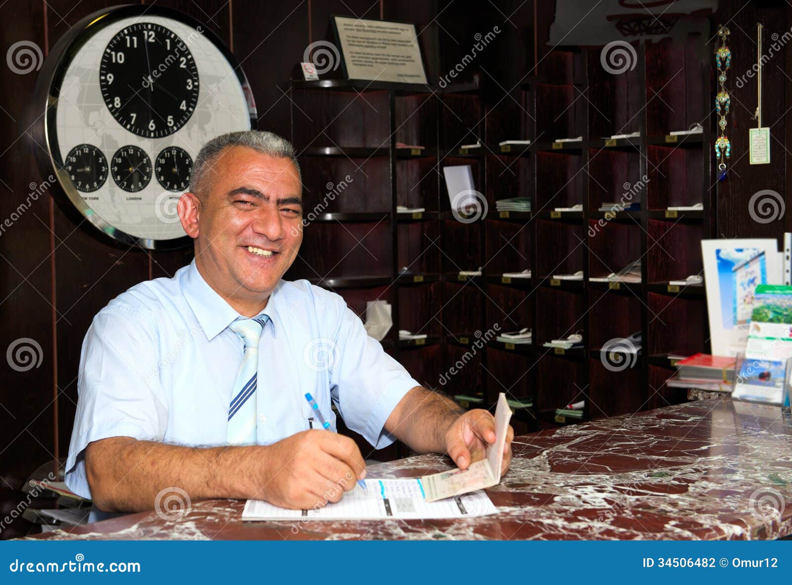Positive Hotel Manager at the Reception Stock Photo - Image of ...