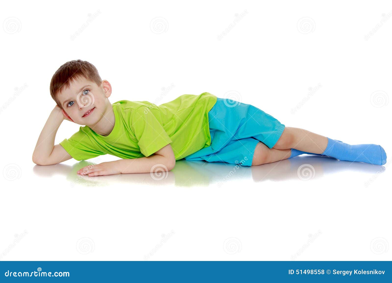 Positive Little Boy Lying on the Floor Stock Photo - Image of alone ...