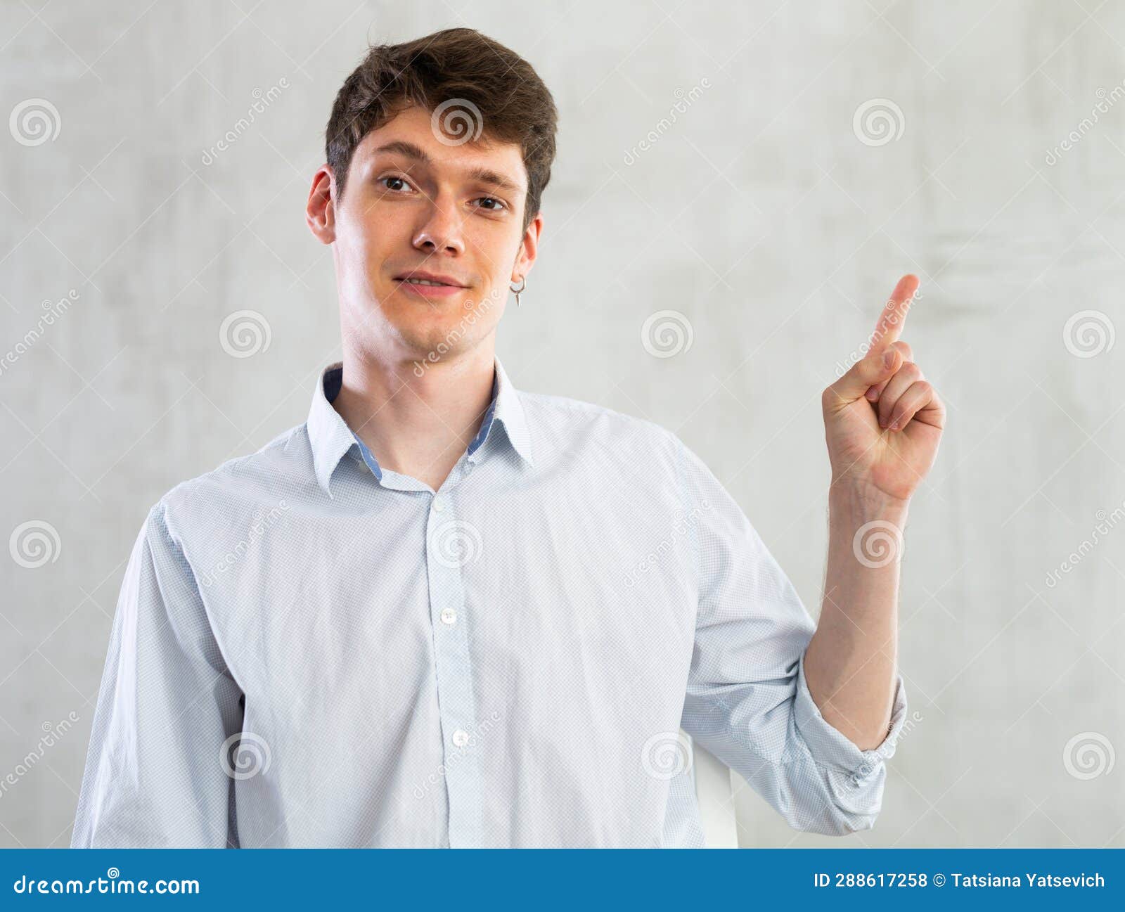 Positive Man Pointing with His Hand at Something - Advertising Concept ...