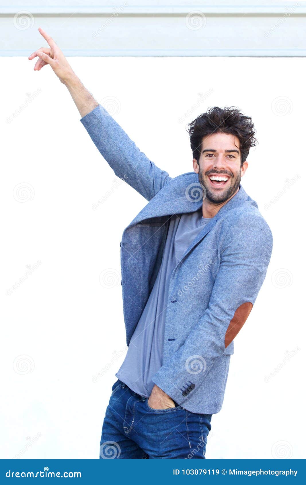 Positive Man Standing with Arm Outstretched Pointing Stock Image ...