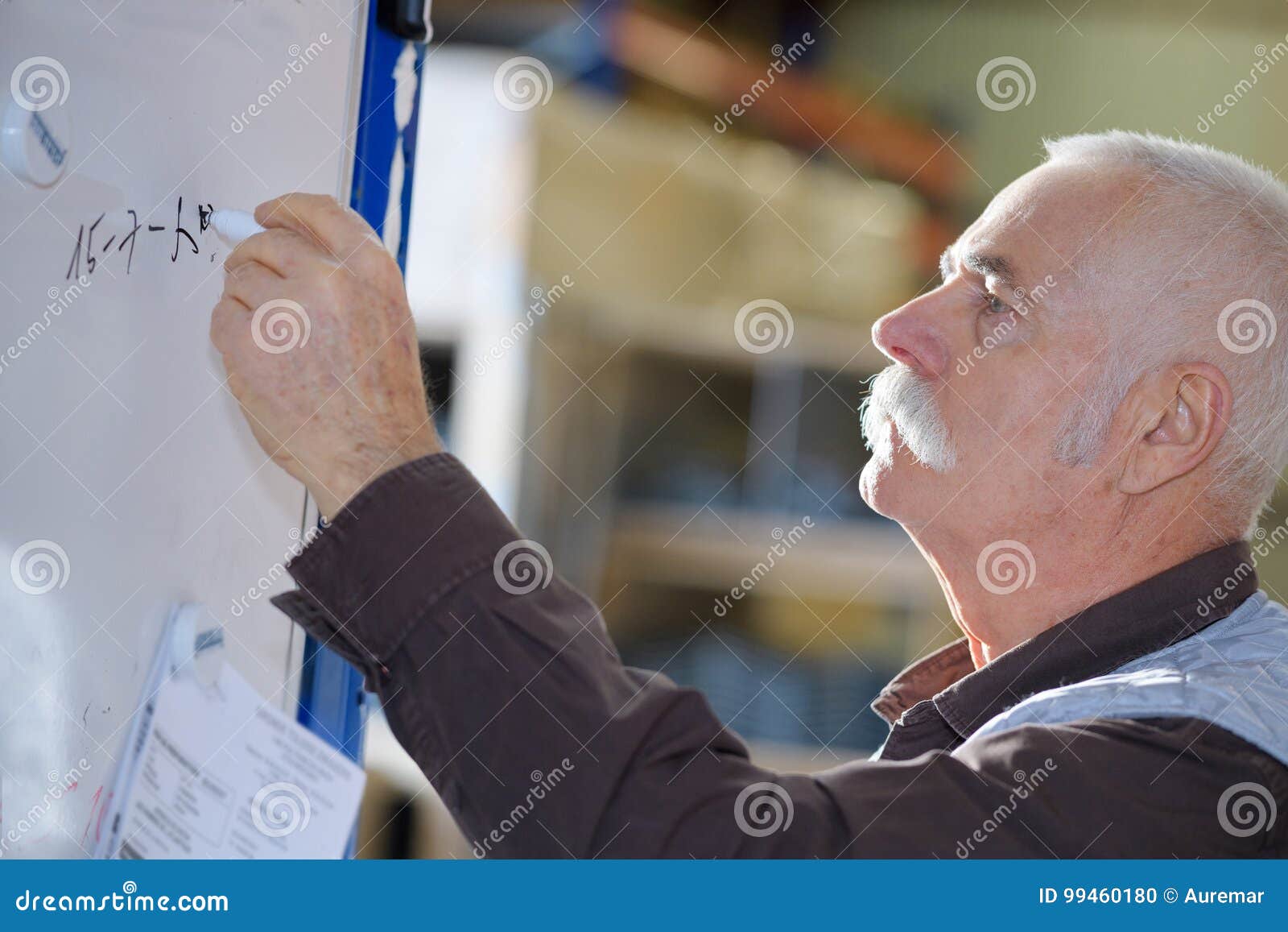 Positive Man Writing on Board Stock Photo - Image of contemporary ...