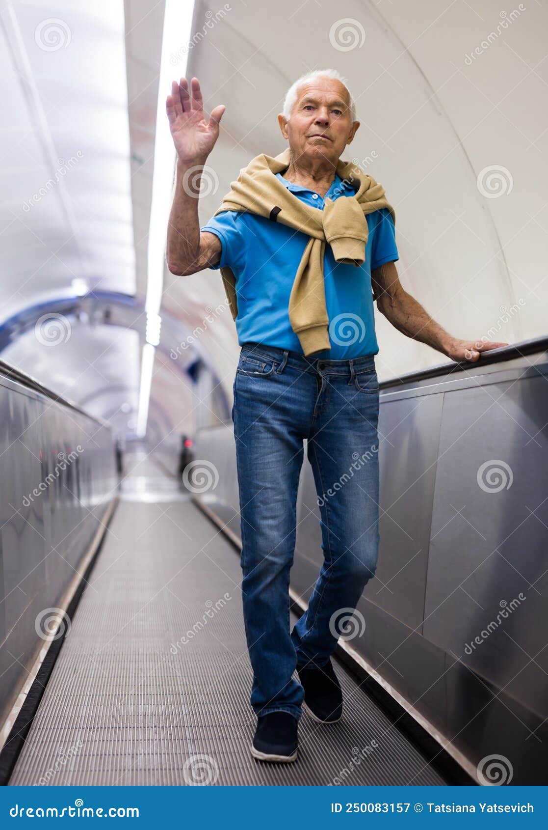 Positive Mature Man Walking Down Escalator To Subway Station Platform ...