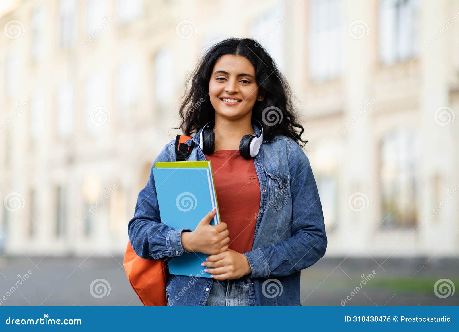 Positive Middle Eastern Lady Student Posing at University Campus Stock ...