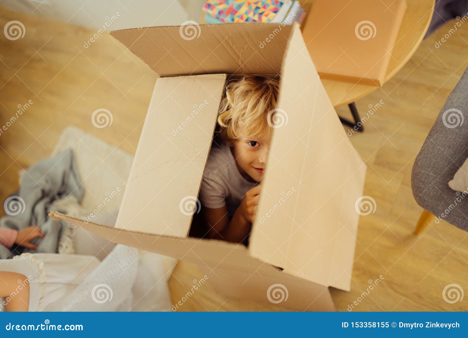Positive Nice Boy Hiding in a Box Stock Image - Image of family, hiding ...