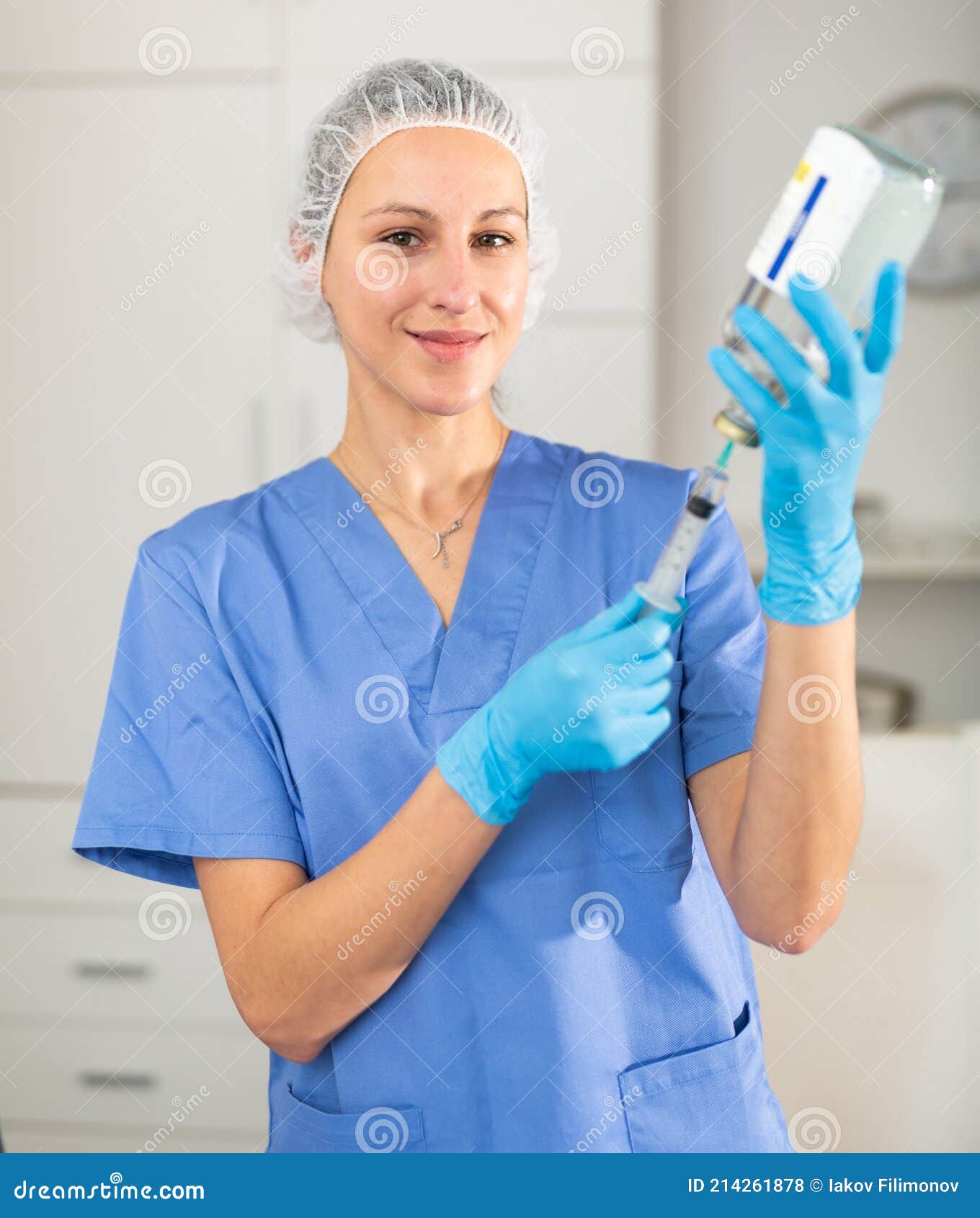 Positive Nurse Taking Injection with Syringe Stock Photo - Image of ...