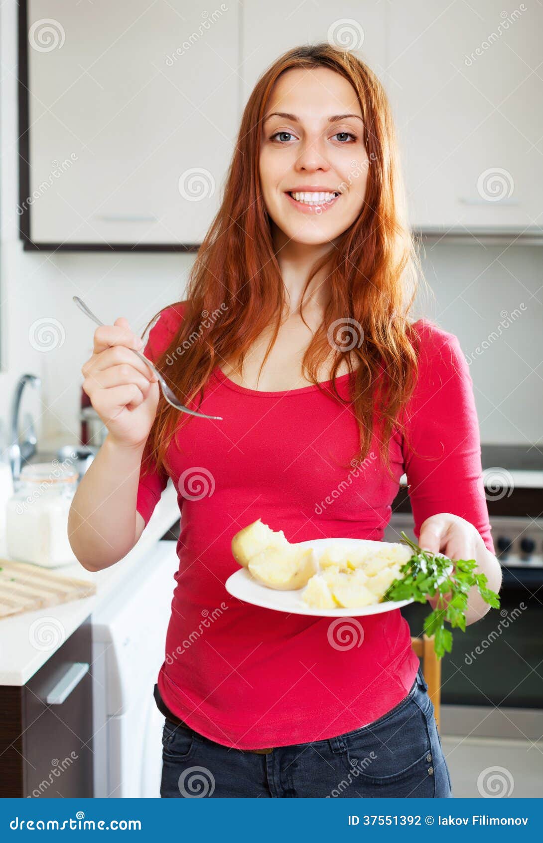 Positive Ordinary Woman Eating Potato Stock Photo - Image of ...