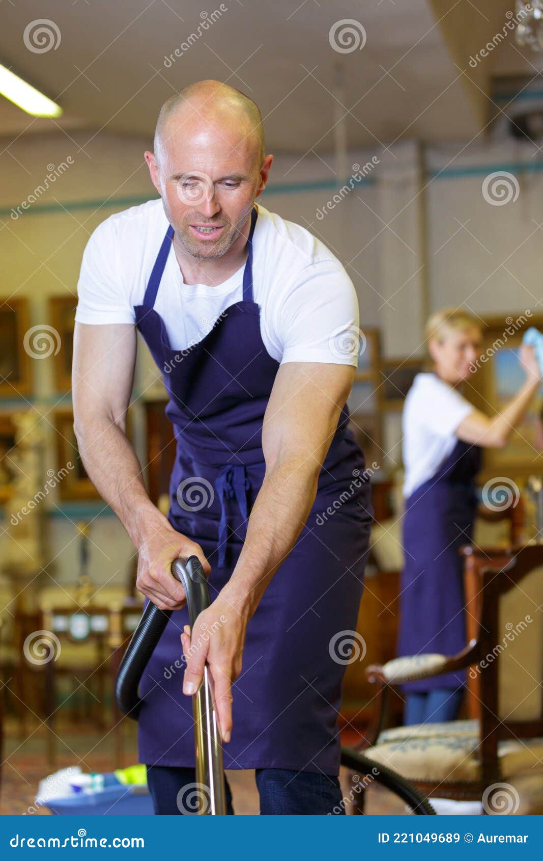 Positive Professional Cleaners Team with Equipment Working at Client ...