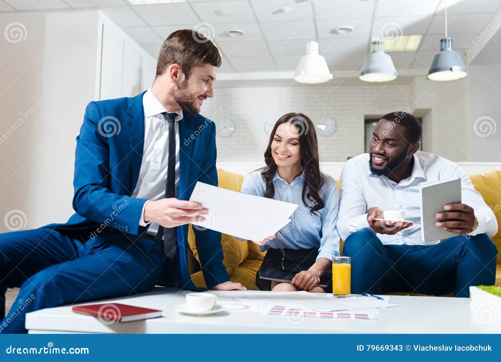 Positive Professional Colleagues Discussing Project Stock Image - Image ...