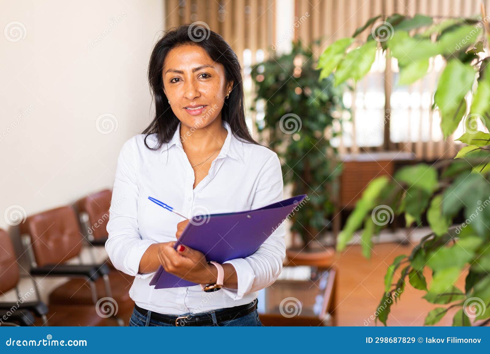 Positive Secretary with Folder for Documents in Office Stock Image ...