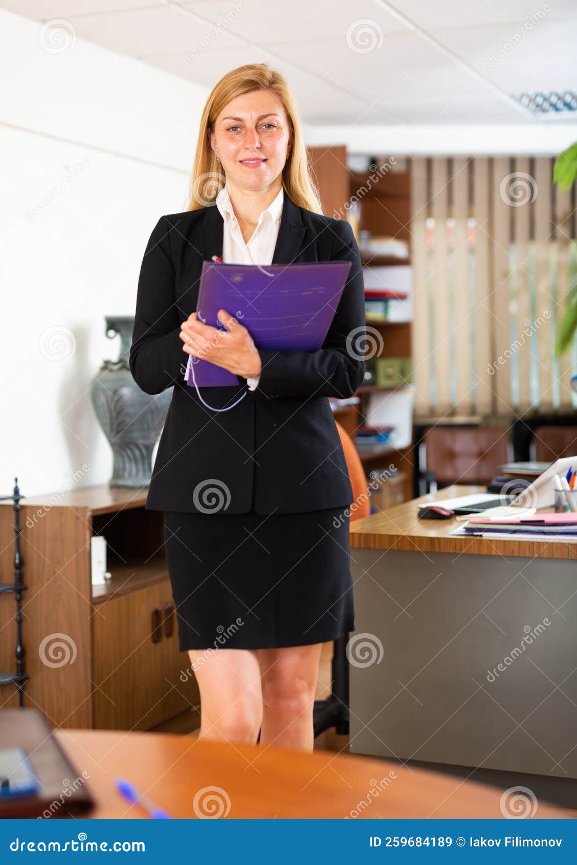 Positive Secretary with Folder for Documents in Office Stock Image ...
