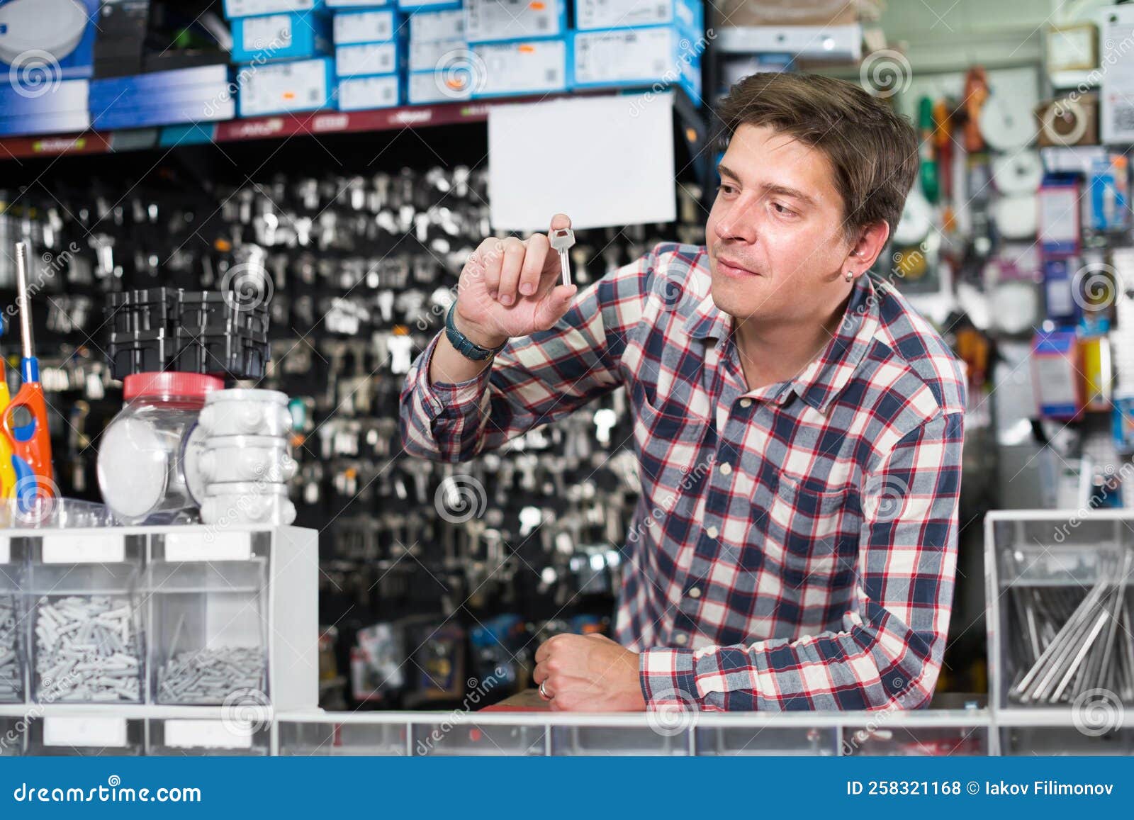 Positive Seller Manufacturing Keys at Store Stock Photo - Image of keys ...