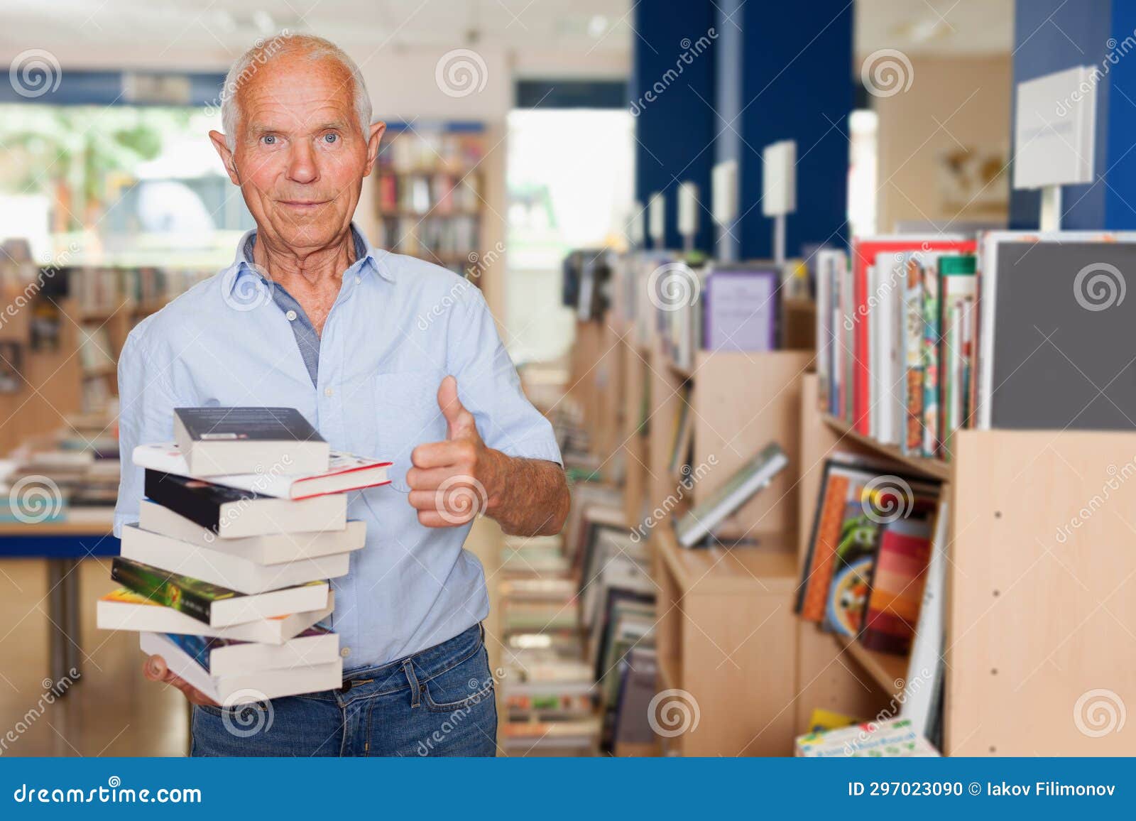 Positive Senior Man with Stack of Books in Hands in Library Stock Photo ...