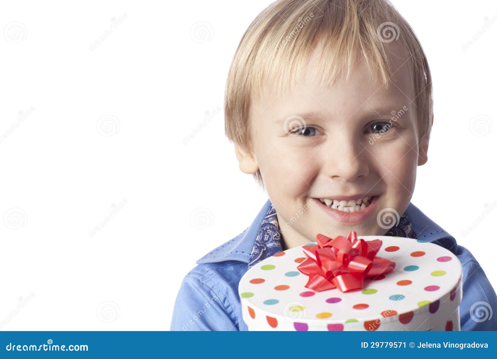 Smiling boy with present stock image. Image of color - 29779571