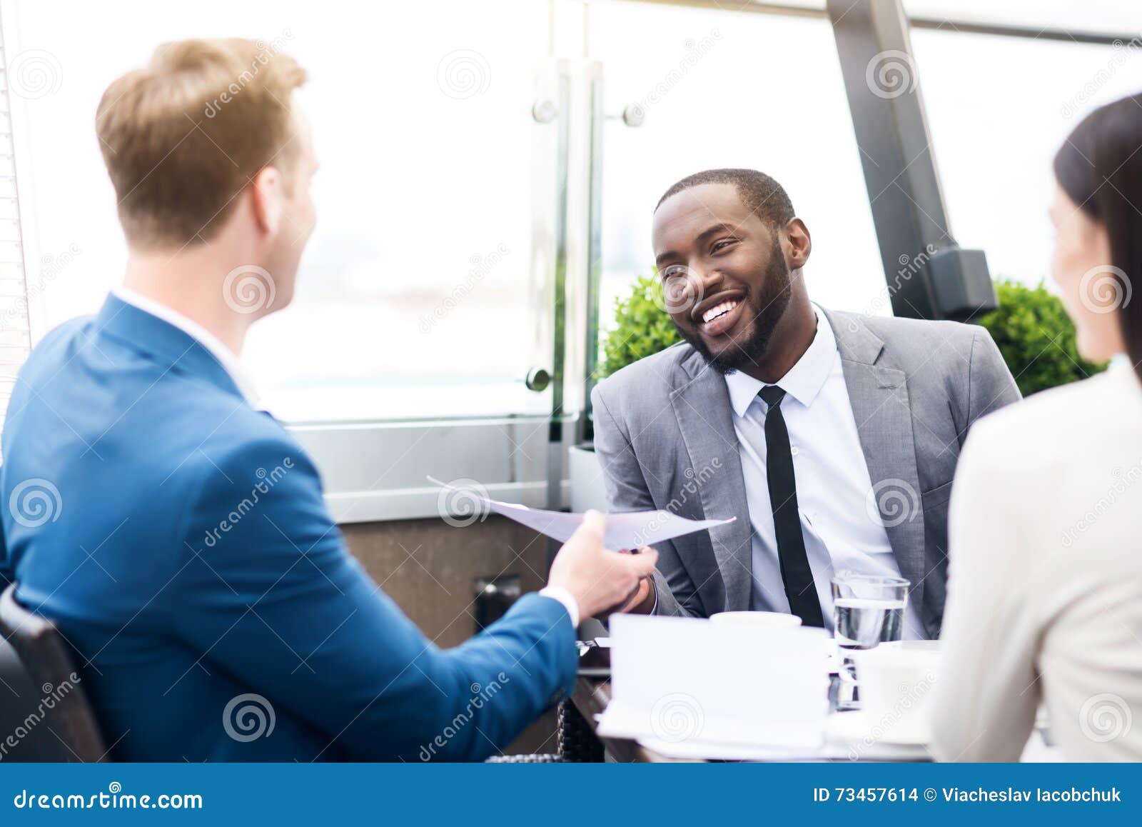 Positive Smiling Colleagues Talking Stock Photo - Image of contemporary ...