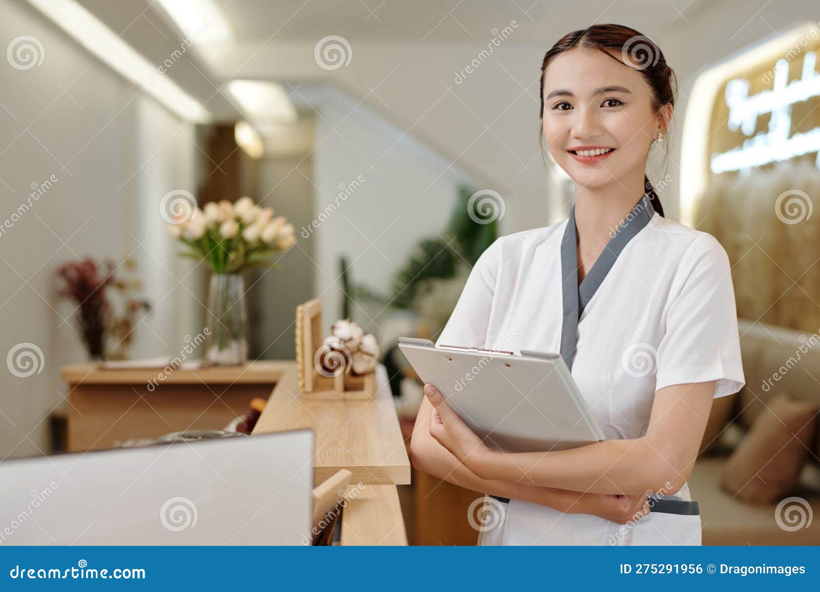 Positive Spa Salon Receptionist Stock Photo - Image of salon, cheerful ...