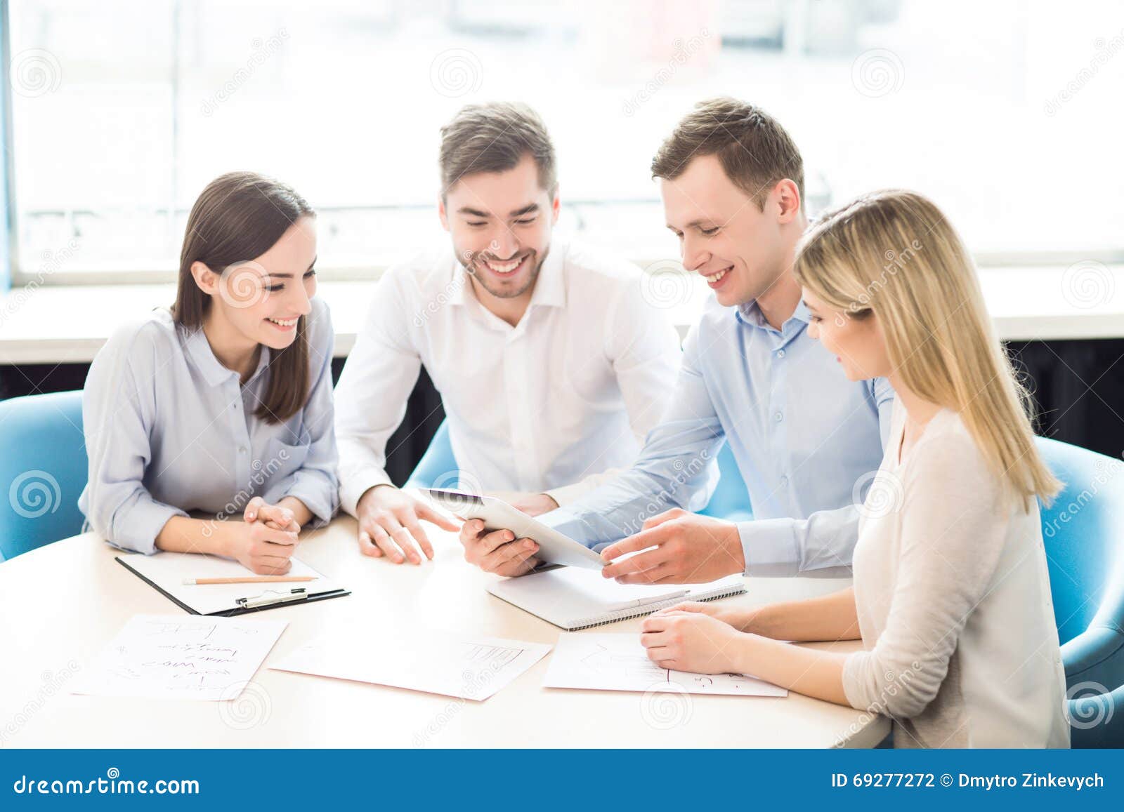 Positive Team Discussing a Project Stock Photo - Image of colleague ...