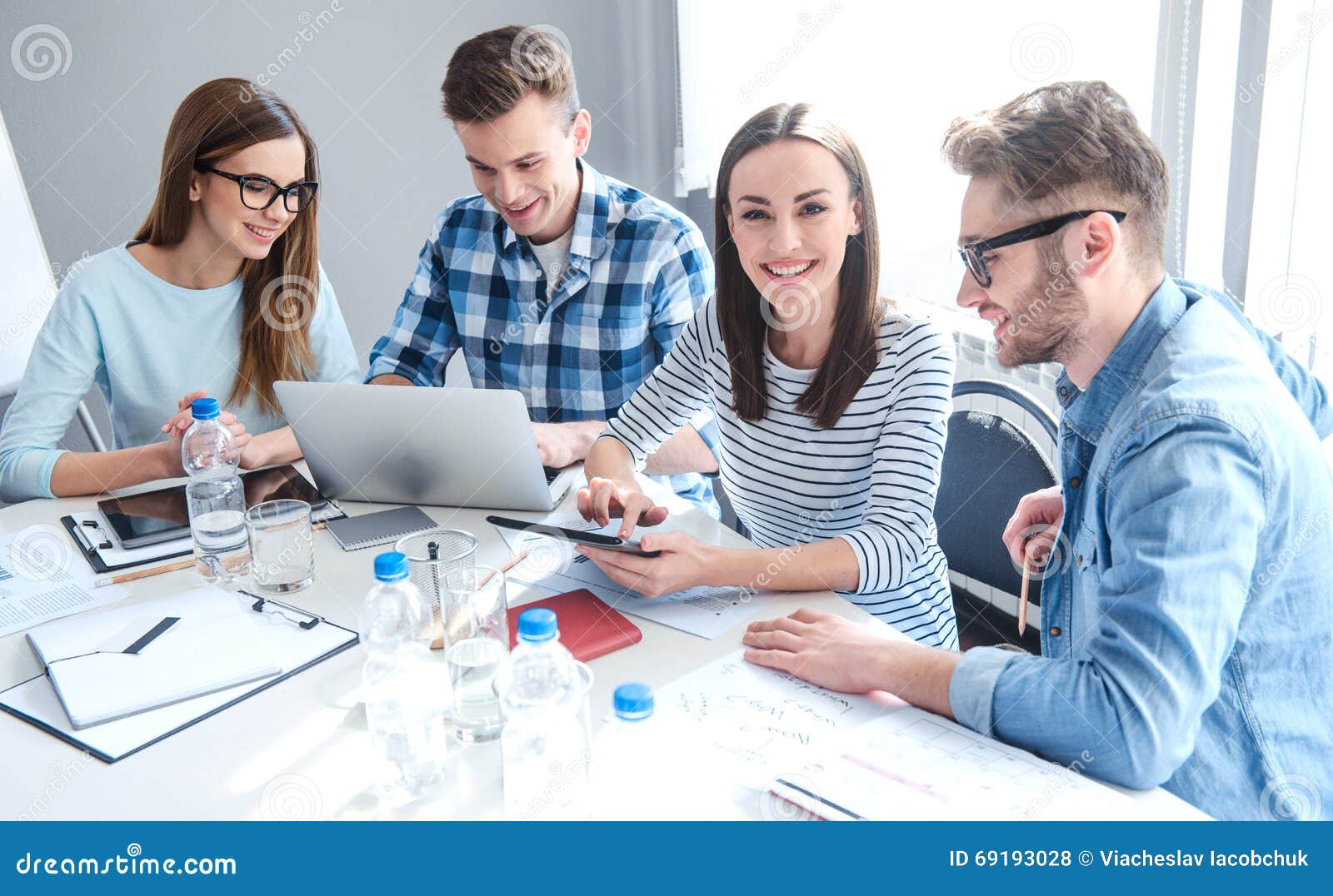 Positive Team Working on the Project Stock Photo - Image of device ...