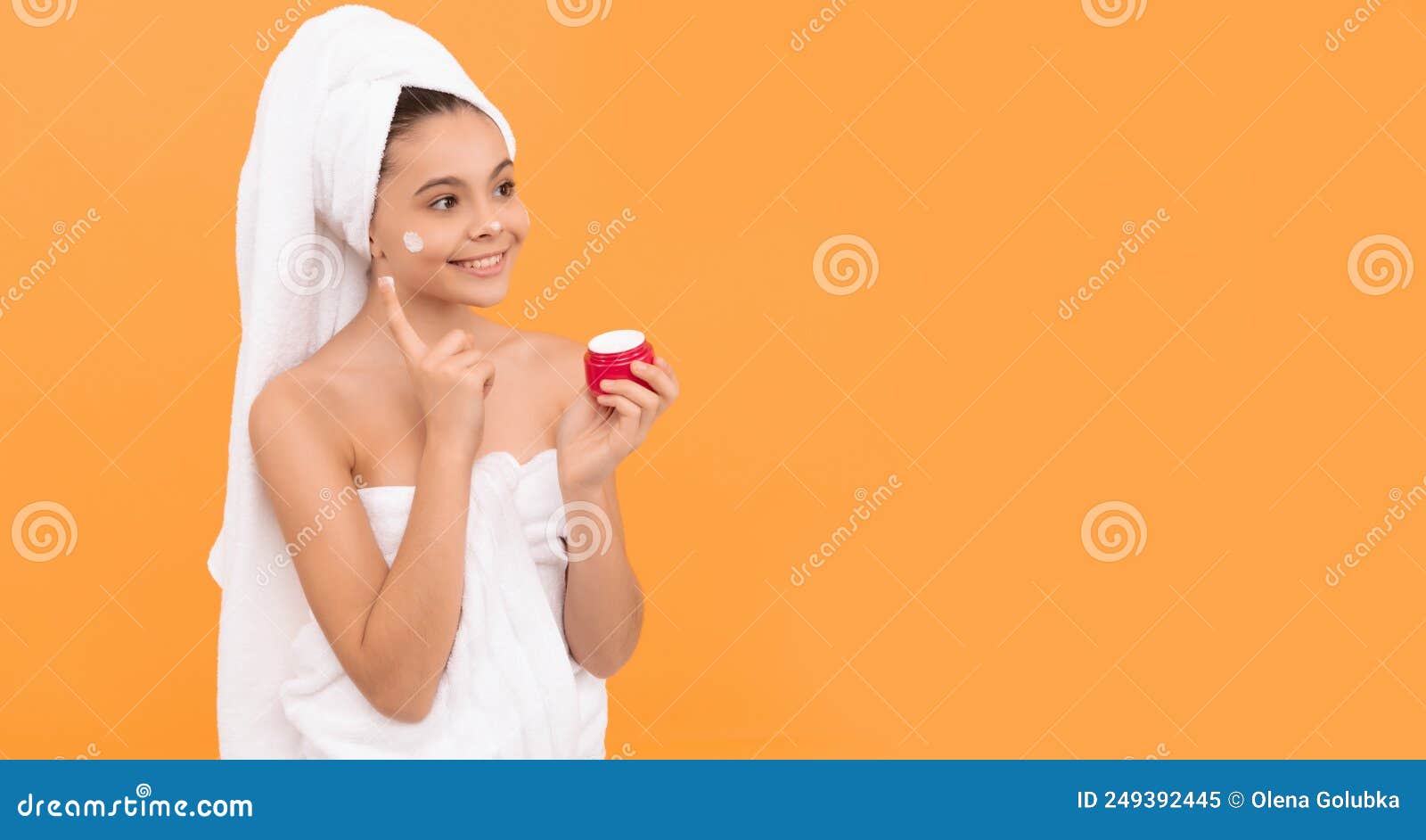 Positive Teen Girl In Shower Towel Apply Facial Cream Stock Image