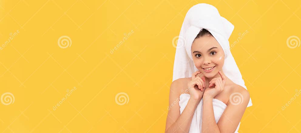 Positive Teen Girl In Shower Towel With Cream On Face Cosmetics And